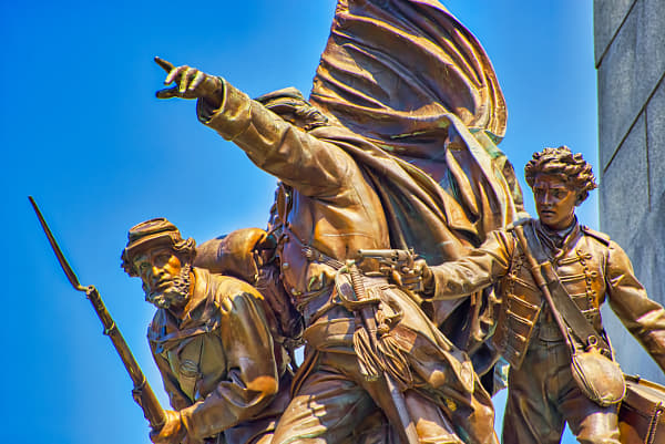 Bronze Statues Pointing Forward Representing Leadership and Collective ...
