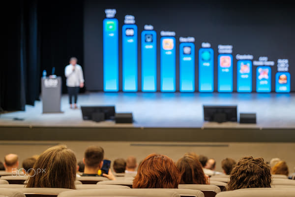 Speaker Presenting Data to Audience Representing Innovation and ...