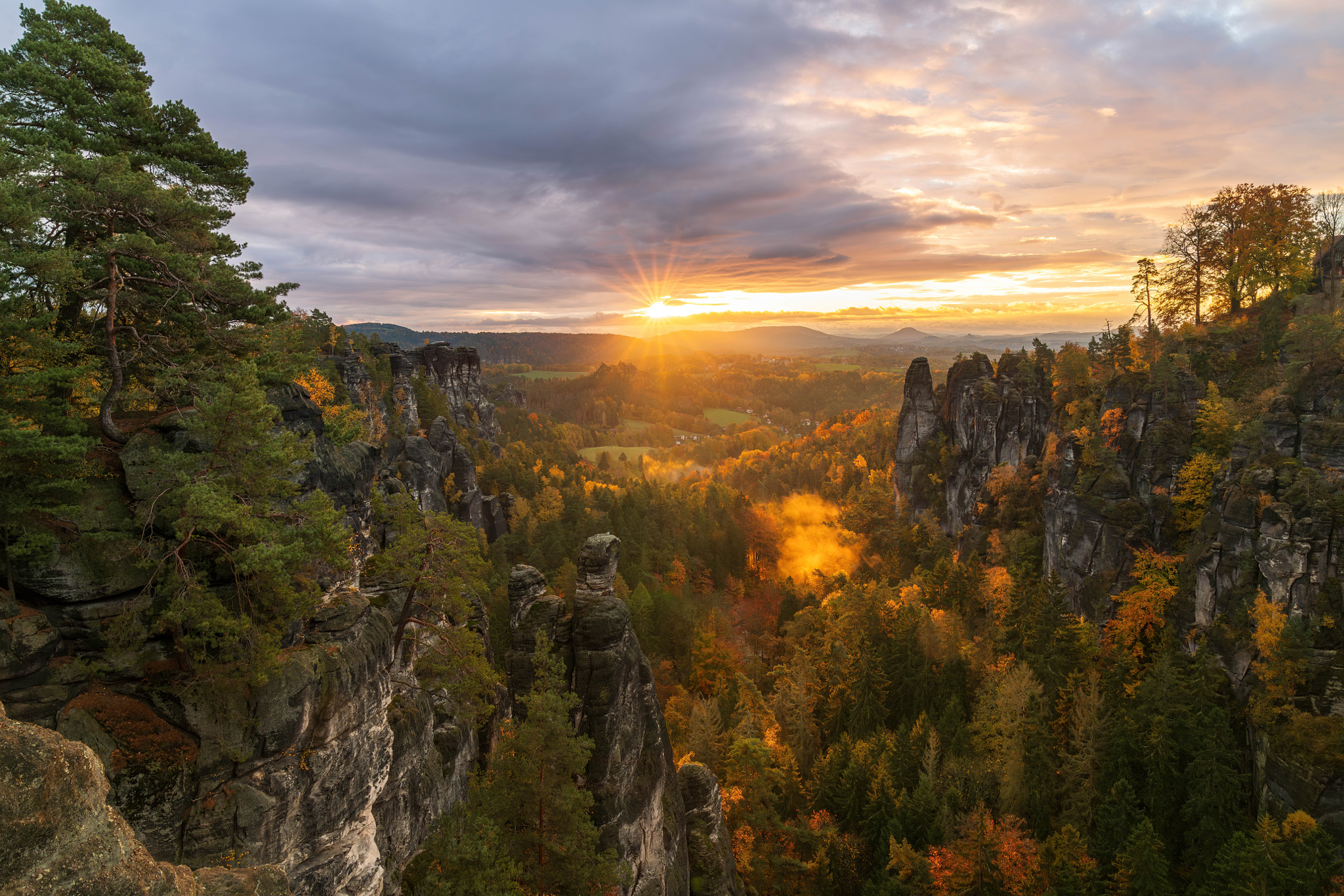Sunset Over Rocky Landscape Evoking Grandeur and Natural Beauty ...
