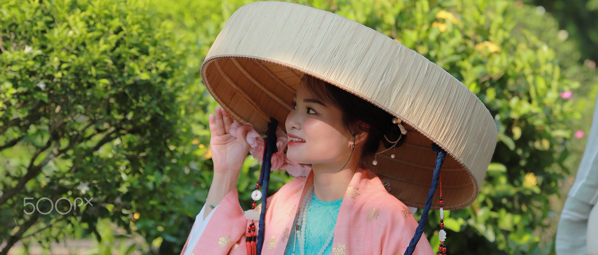 Woman in Traditional Hat Reflecting Cultural Heritage and Grace ...