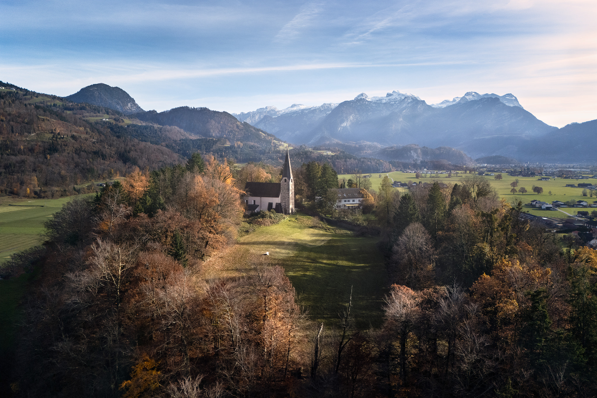 Church in Valley with Mountains Evoking Peace and Grandeur | landscape ...