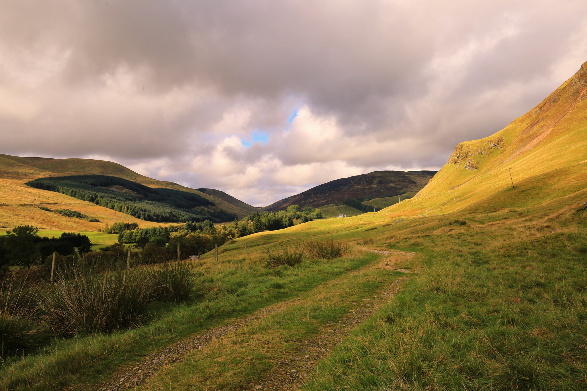 Rolling Hills Under Dramatic Sky Evoking Freedom and Natural Majesty ...