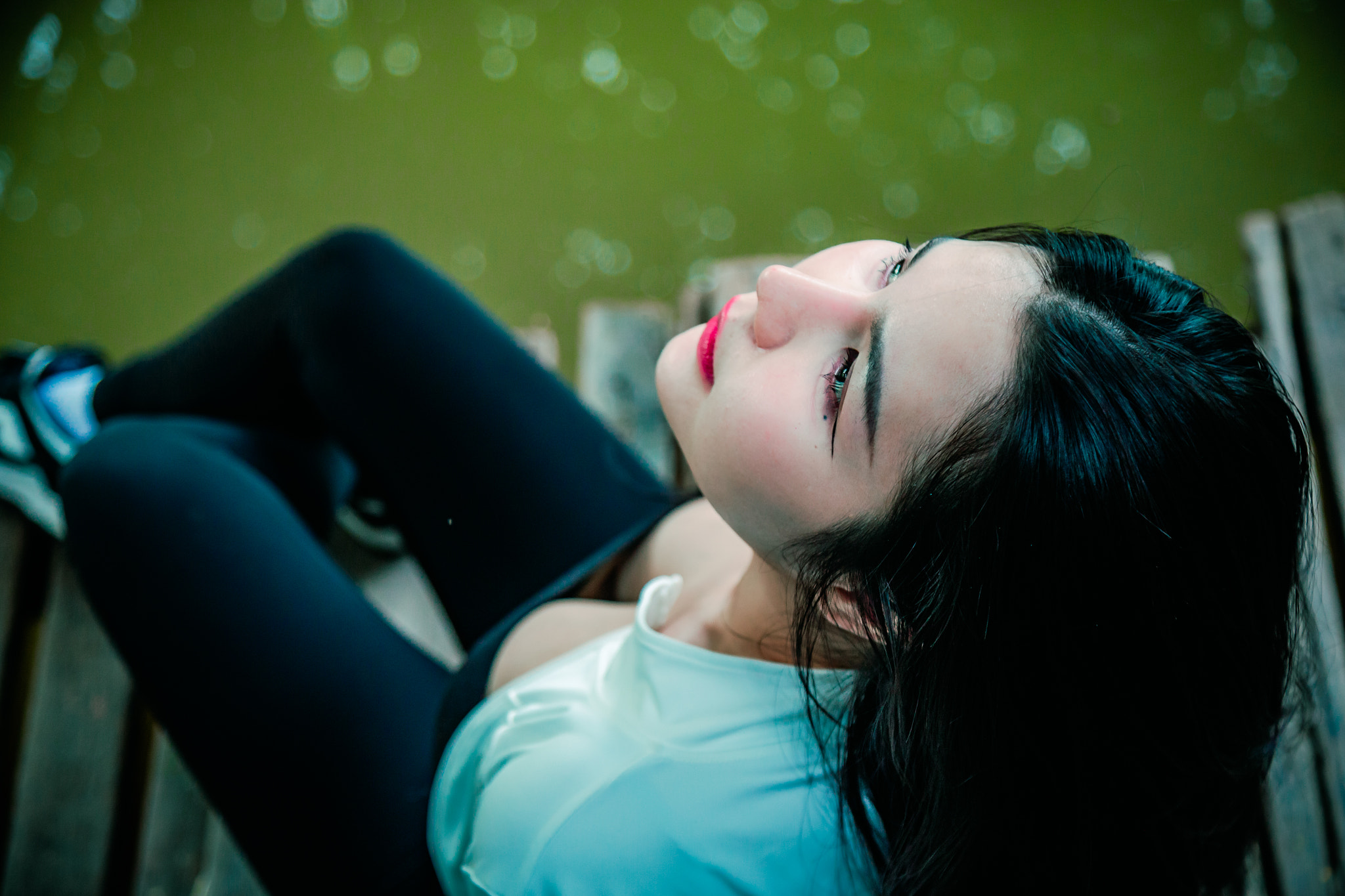 Woman Lounging by Water Evoking Relaxation and Inner Peace | people ...