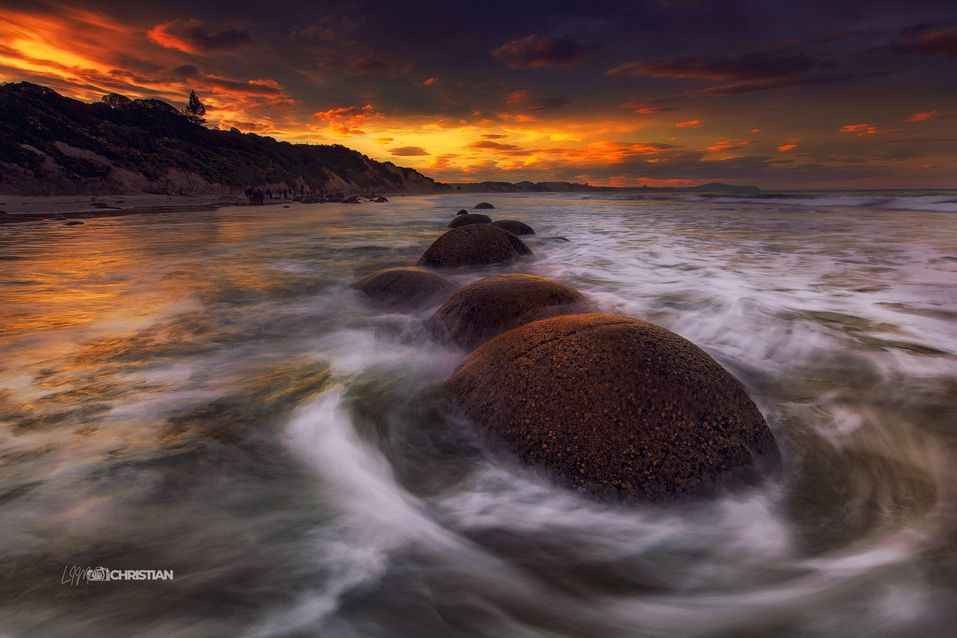 Dramatic Sunset Over Ocean Rocks Evokes Serenity and Timeless Beauty ...