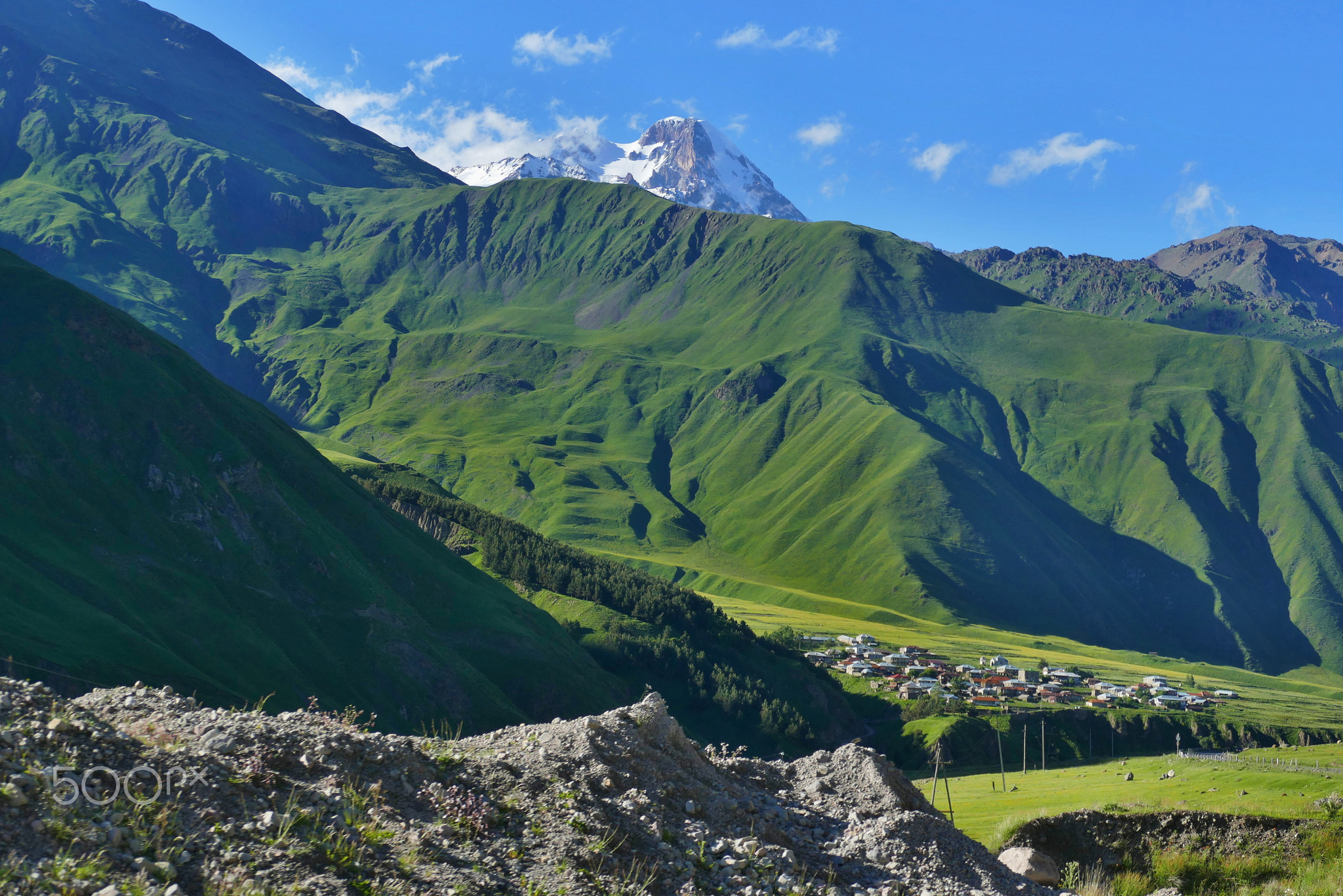 Lush Green Mountains Under a Clear Sky Evoking Grandeur and Serenity ...