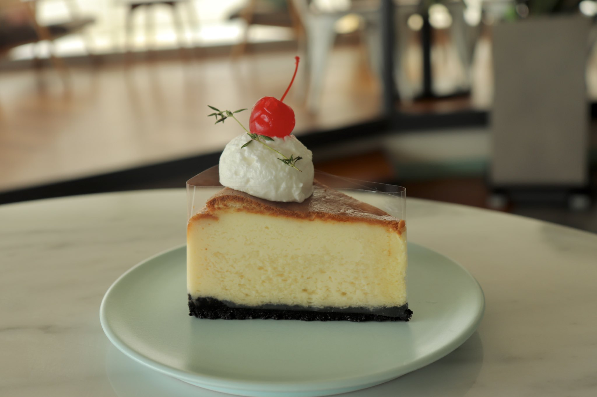 Cheesecake Slice Offers Sweet Respite in Bright Cafe | still life photo ...
