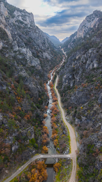 Mountain Valley with Winding Road Evoking Adventure and Grandeur ...