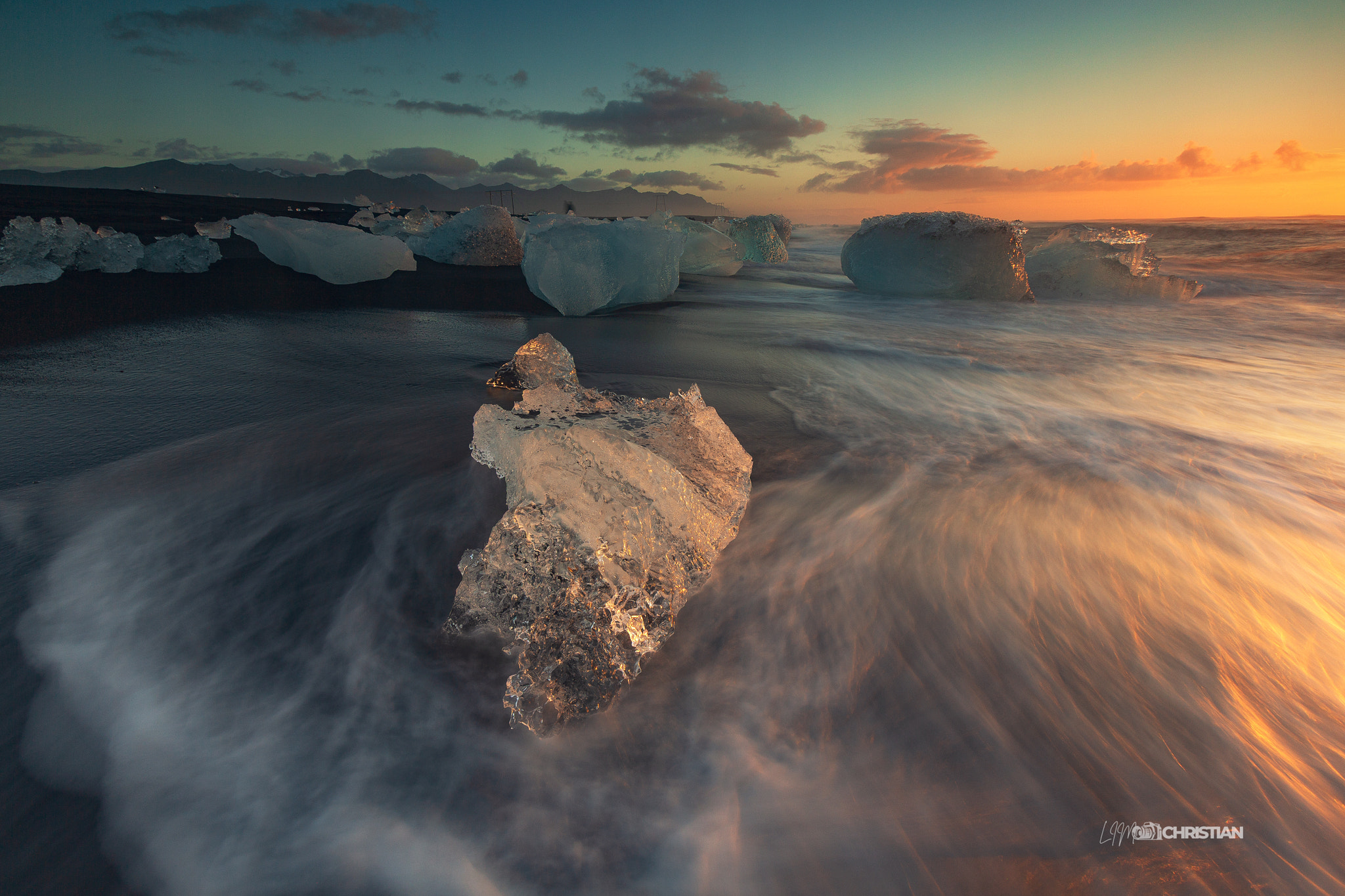 Ocean Waves Embrace Rocky Shoreline at Sunset Evoking Tranquility ...