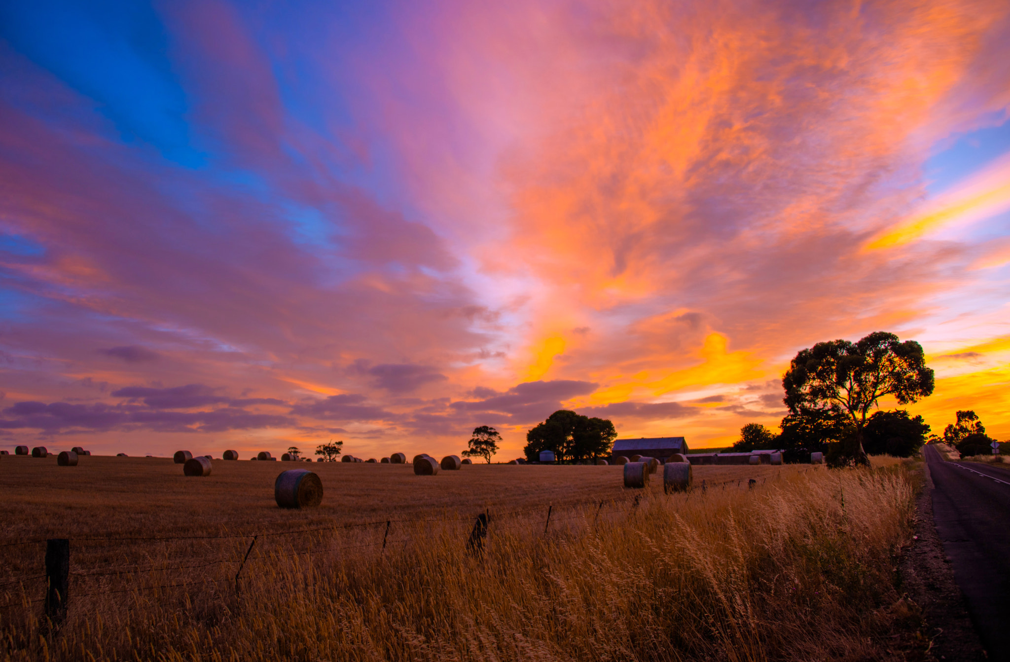 Vibrant Sunset Over Rural Fields Evoking Nostalgia and Tranquil Endings ...
