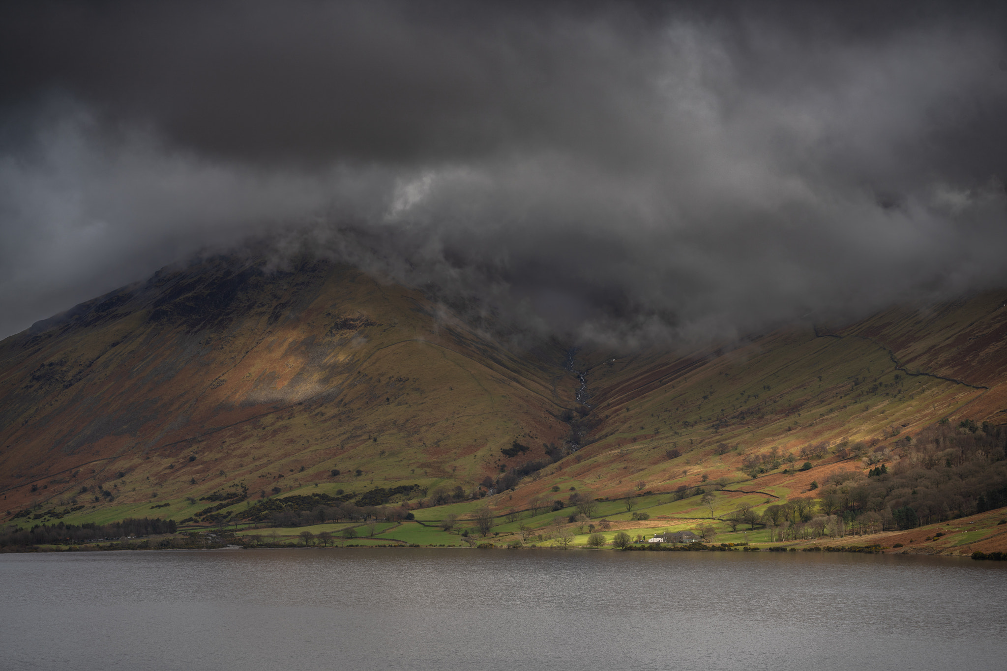Dramatic Mountainside Reflecting Somber Mood and Untamed Wilderness ...