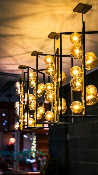 Illuminated Chandeliers Casting Warmth Symbolizing Luxury and Modern ...
