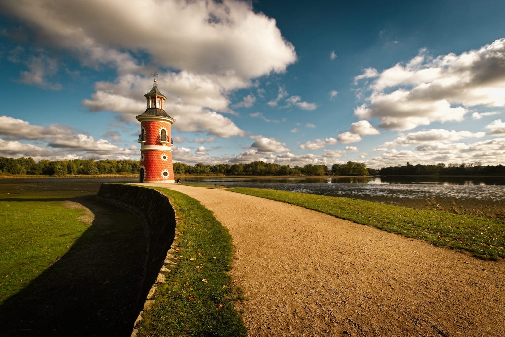 Winter landscape in a snow-covered park after a heavy wet snowfall. A ...