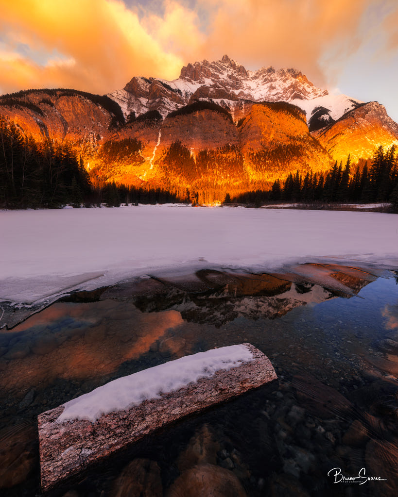 Majestic Mountain Range Illuminated by Golden Light Reflecting Serenity ...