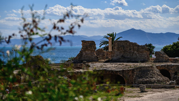 Ancient Ruins Overlook Azure Sea Evoking History and Timelessness ...