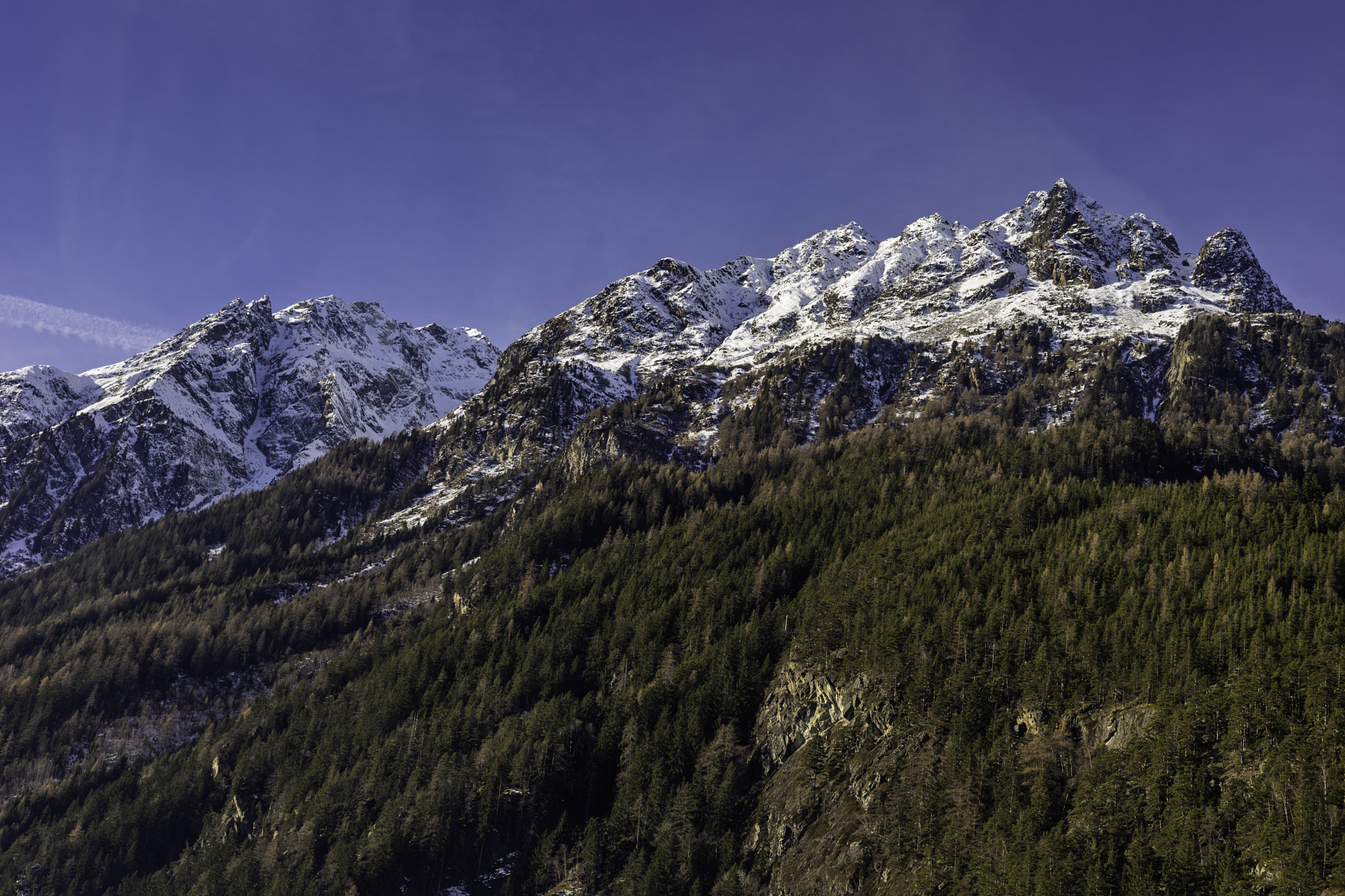 Majestic Mountain Range Under Blue Sky Evoking Grandeur and Serenity ...