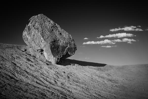 Solitary Boulder in Barren Landscape Evoking Resilience and ...