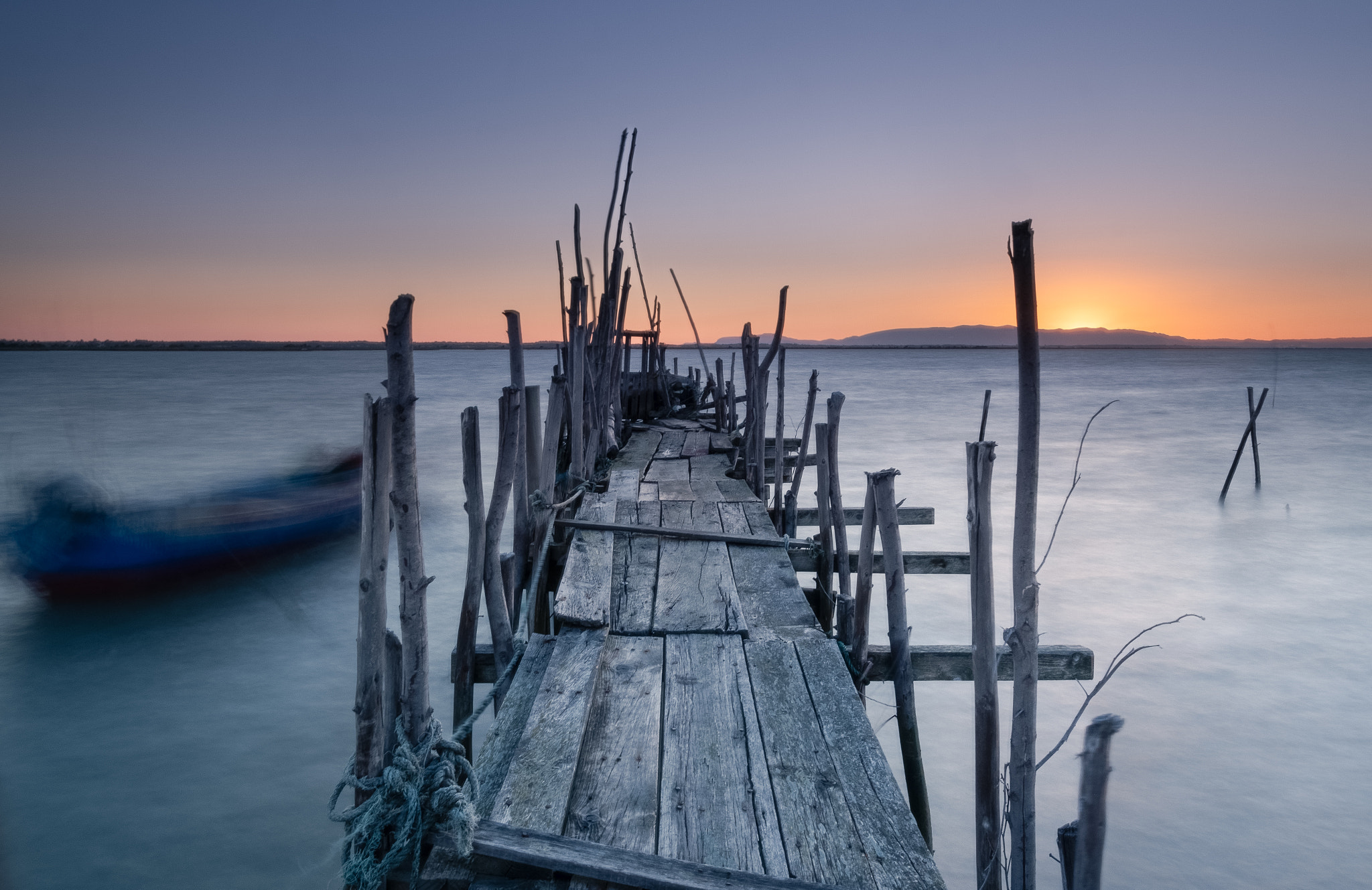 Dilapidated Pier Extending into Horizon Symbolizing Time and Solitude ...