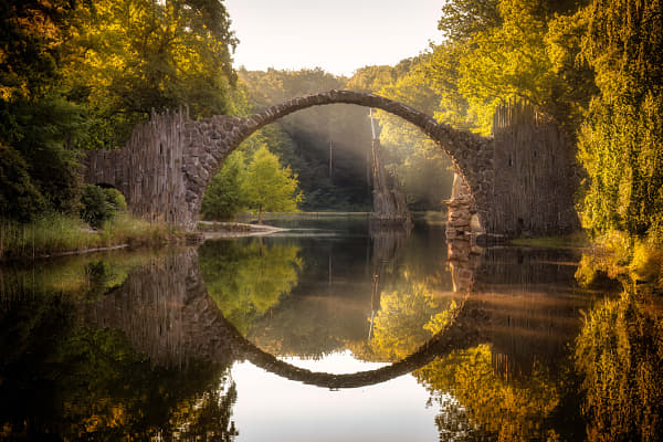 Ancient Stone Bridge Reflected in Water Symbolizing Timelessness ...