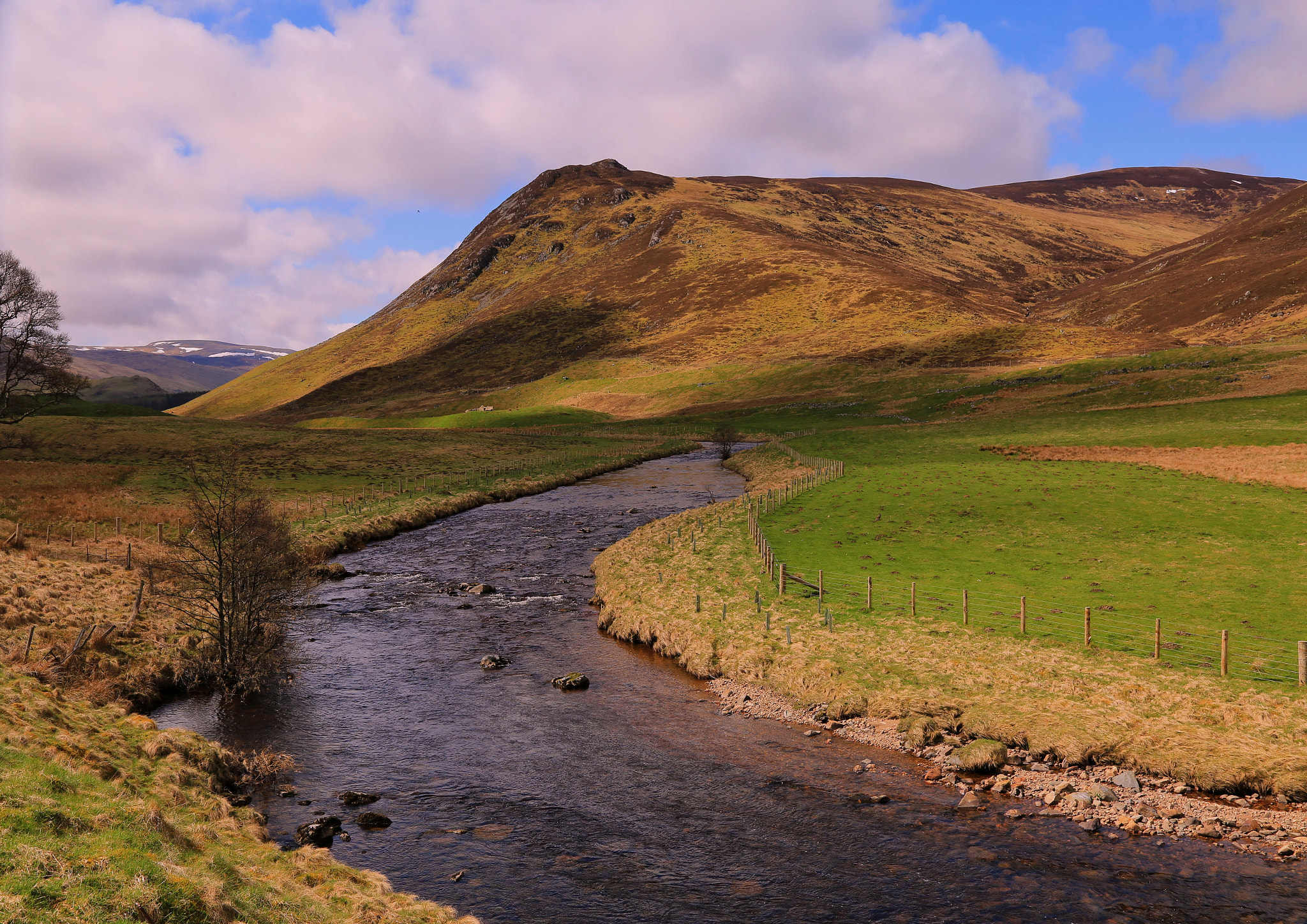 Winding River Flowing Through Verdant Hills | landscape photo by Hilda ...