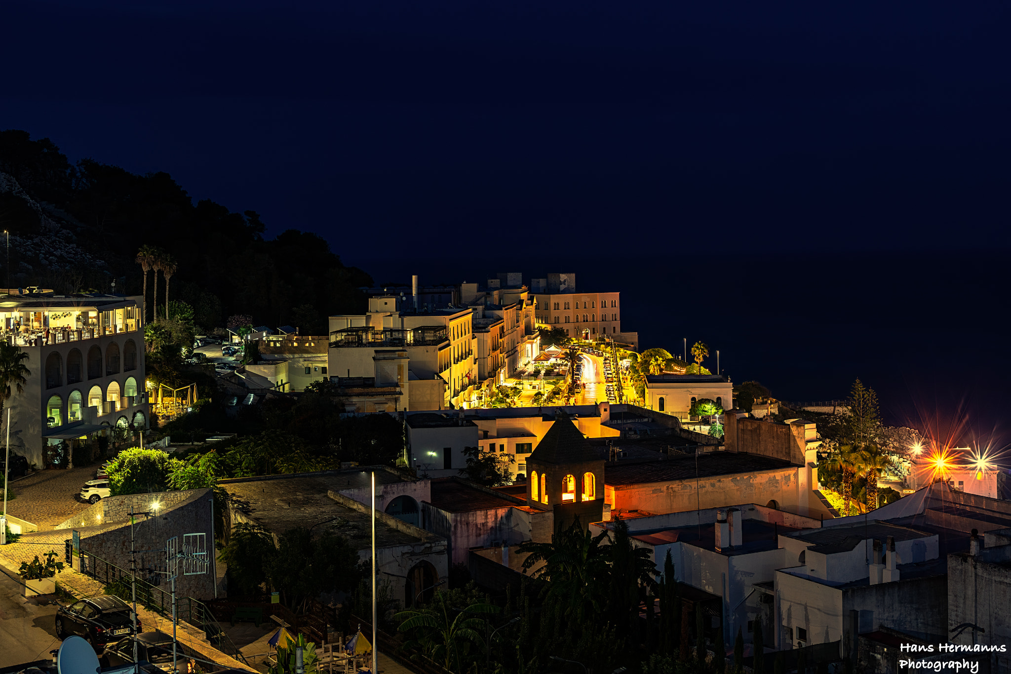 Illuminated Coastal Town at Night Evoking Charm and Vibrancy | city ...