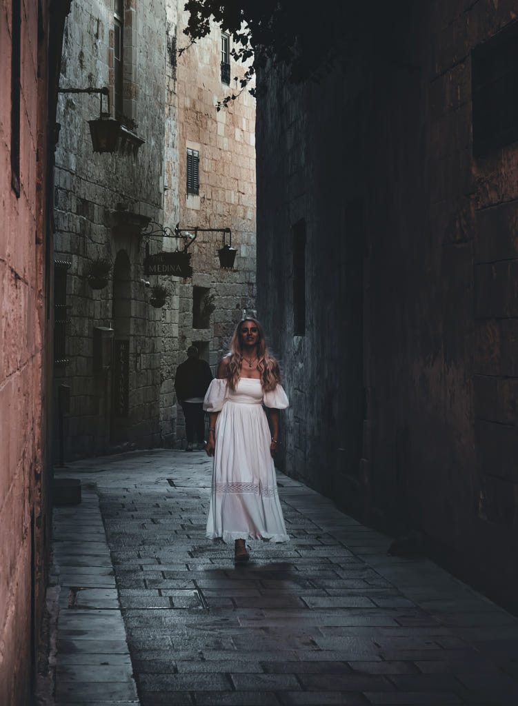 Woman in Alleyway Evoking Mystery and Solitude | people photo by ...