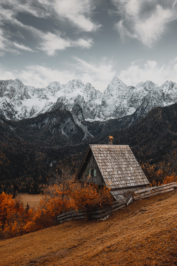 Remote Cabin in Autumn Mountains Symbolizing Solitude and Wilderness ...