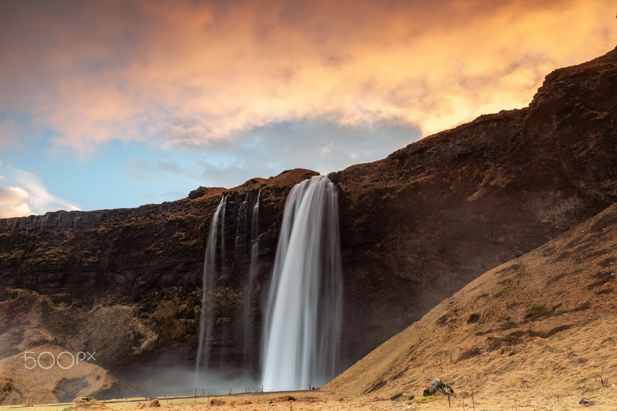 Majestic Waterfall Under Dramatic Sky Evoking Awe and Power | landscape ...