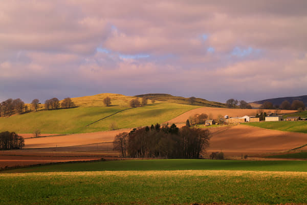 Rolling Hills Under Dramatic Sky Portraying Vastness and Natural Beauty ...