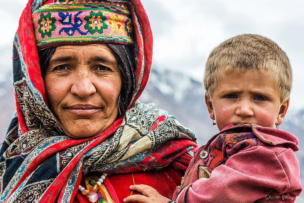 Wakhi Woman and Her Baby by Sher Ali Saafi / 500px