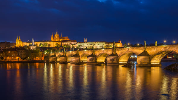Prague castle loacated behind Charles bridge by Natapong Paopijit | 500px