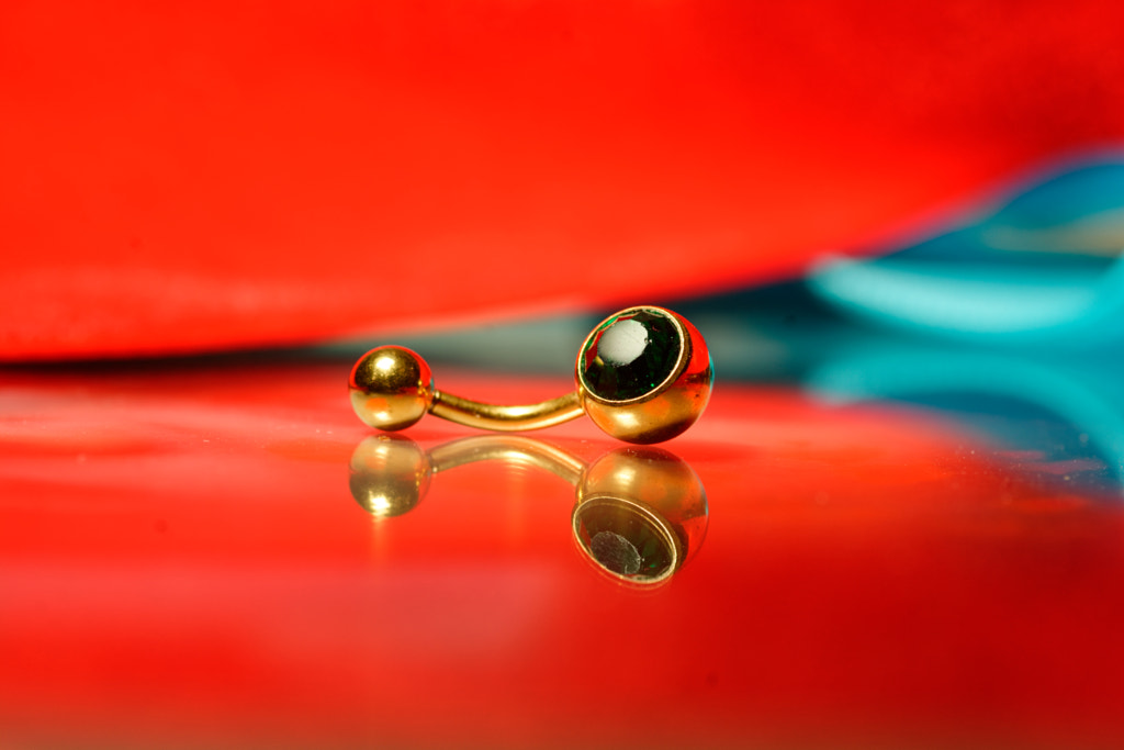 Navel piercing in the red by Piercing Instinct / 500px