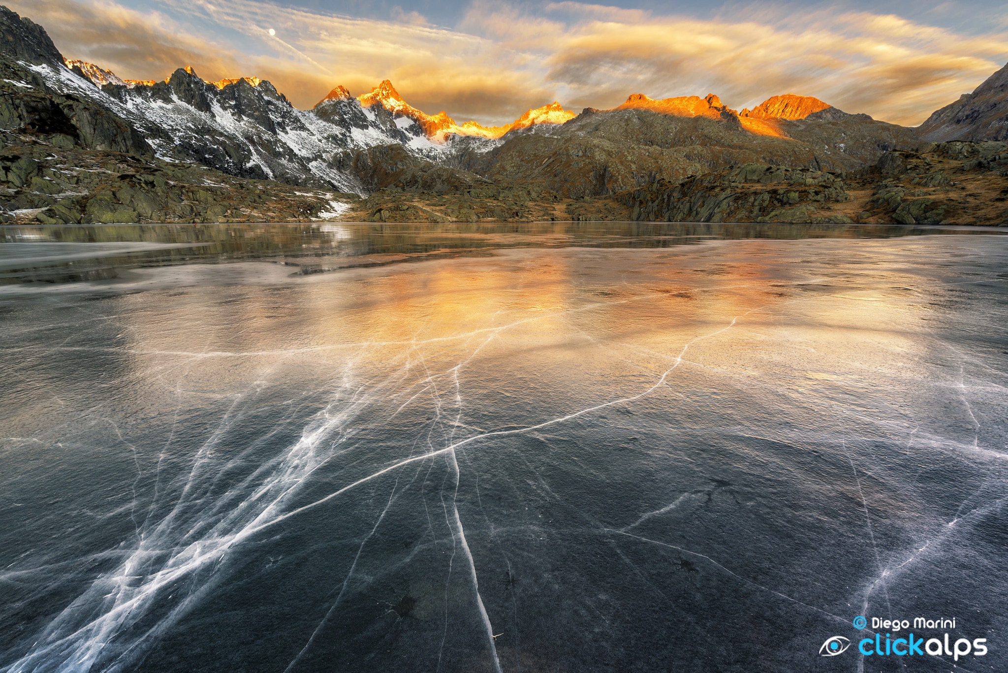 Black lake at dawn by Diego Marini / 500px