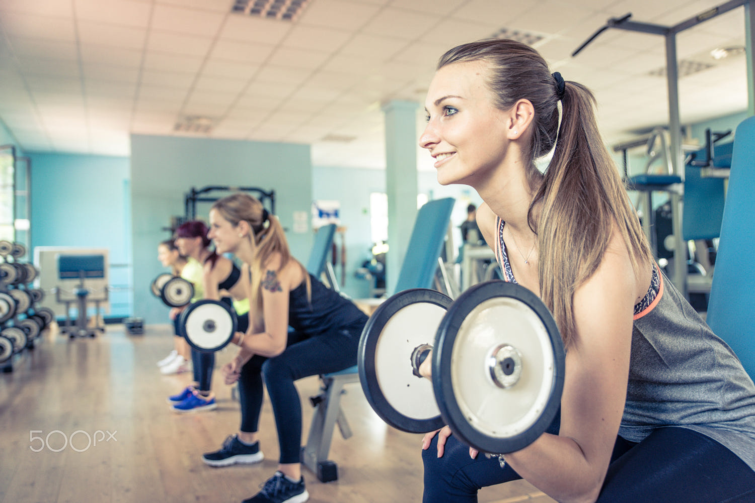group of girls training in the gym by Cristian Negroni / 500px