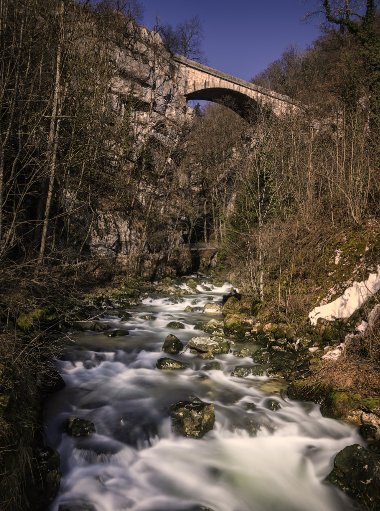 Ancient Bridge Over Rushing River | landscape photo by Maximilian Hahn ...