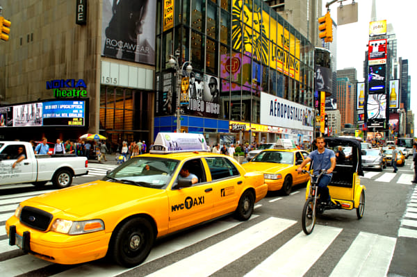 Times Square, The Crossroads of the World, with the famous yellow cab ...