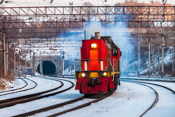 Red diesel engine shunting locomotive on the railroad by Yury Stroykin ...