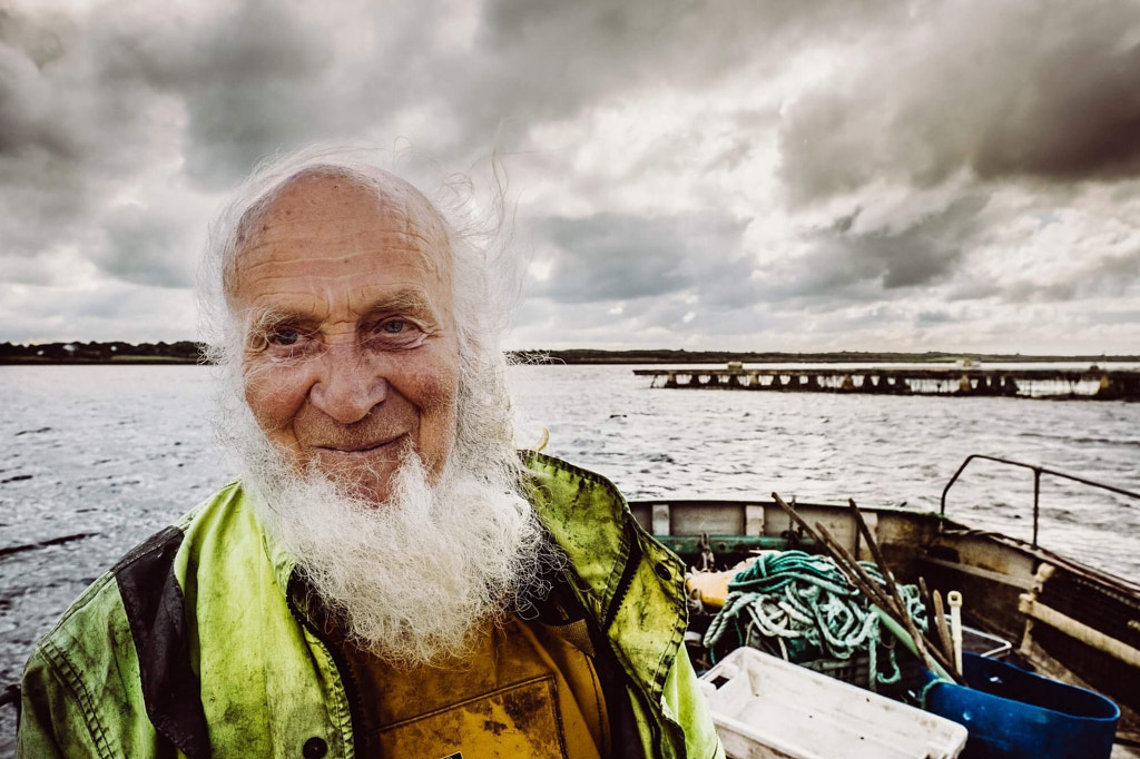 Rainer Krause “The German” on his trawler out in Kinvara Bay by Markus ...