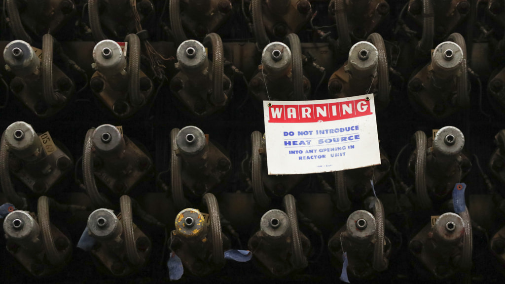 Reactor Warning Sign by David Miller / 500px