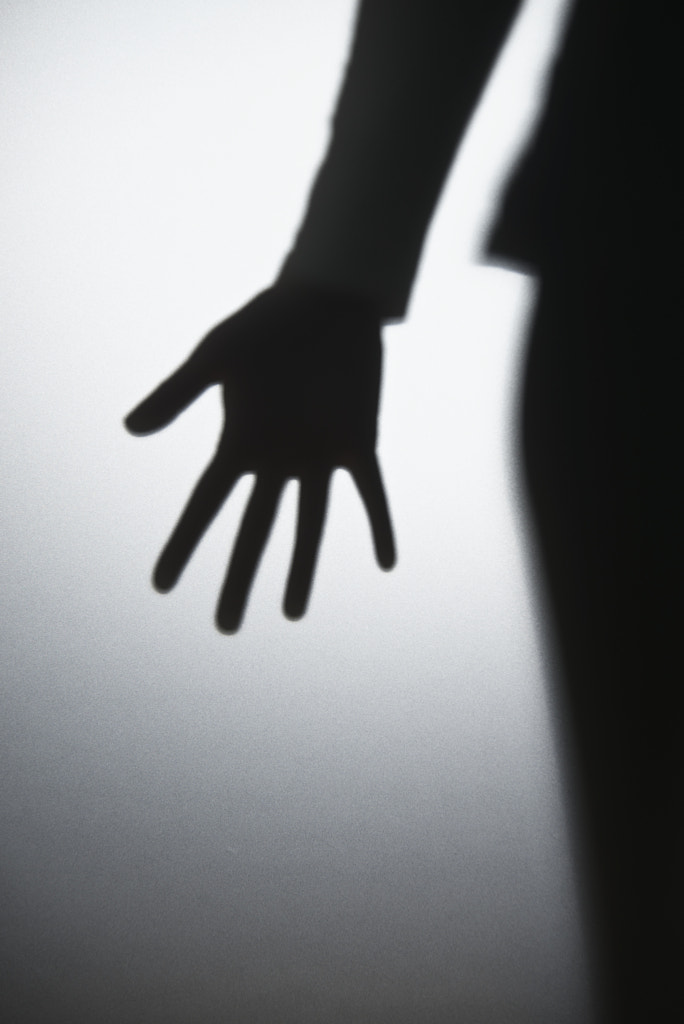 shadowed hand by Lars Zahner / 500px