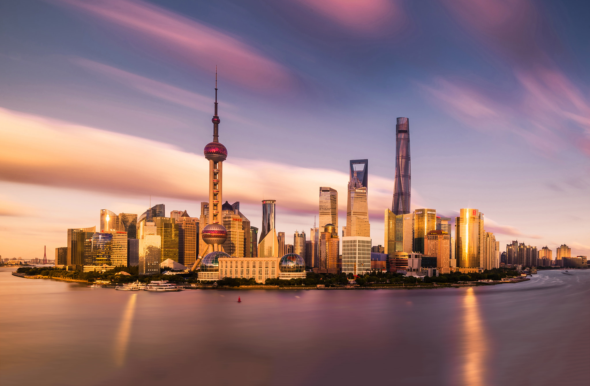 Shanghai Pudong at sunset by David Dai / 500px