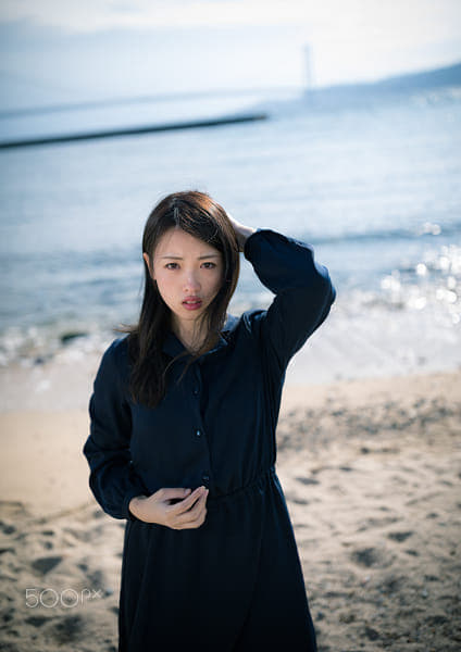 Young Woman Posing on a Sandy Beach | people photo by sono sheet | 500px