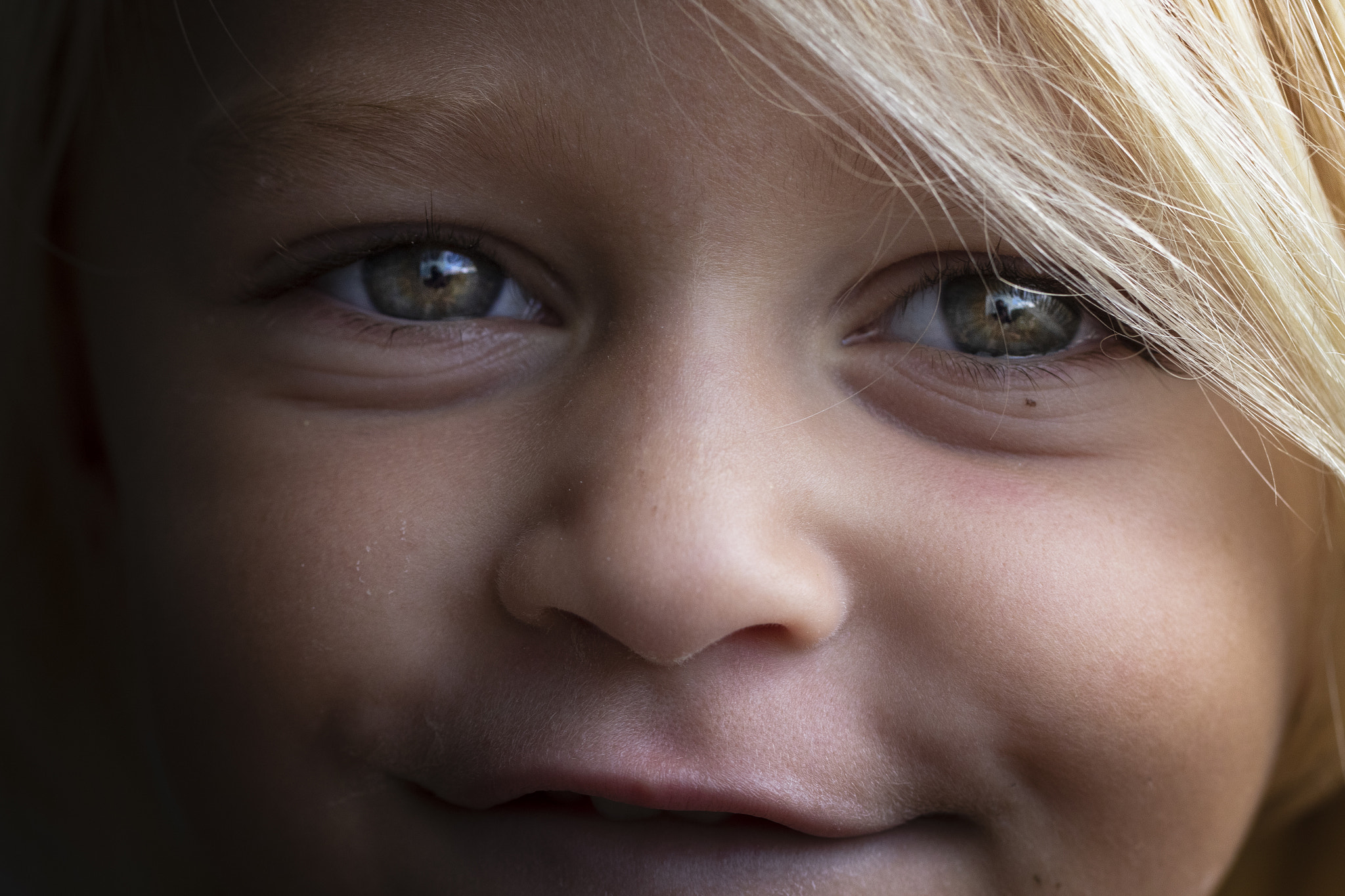 Close Up of a Young Childs Smiling Face | people photo by Loic Harnisch ...