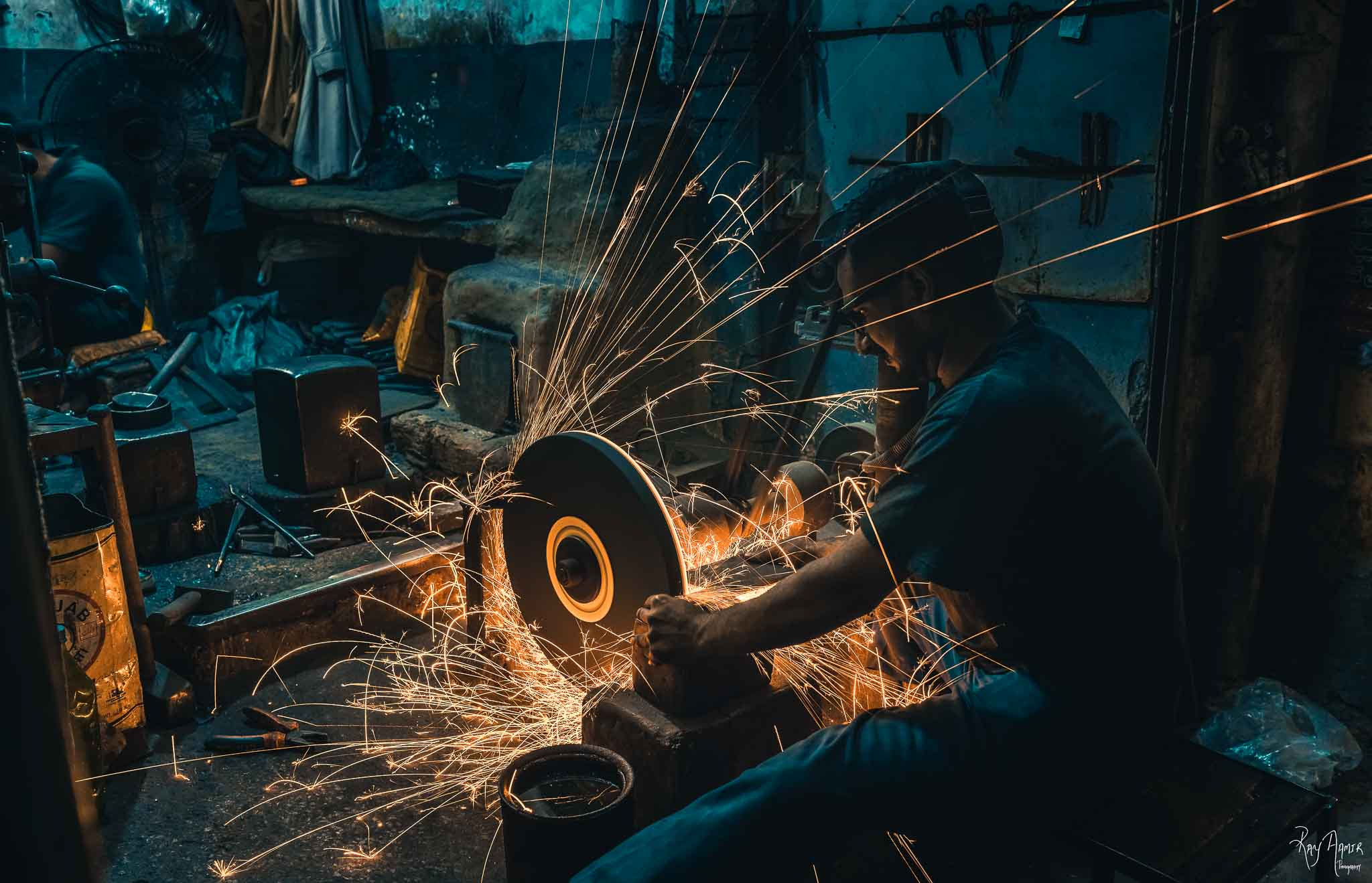 Worker Grinding Metal with Sparks Flying | still life photo by Ray ...