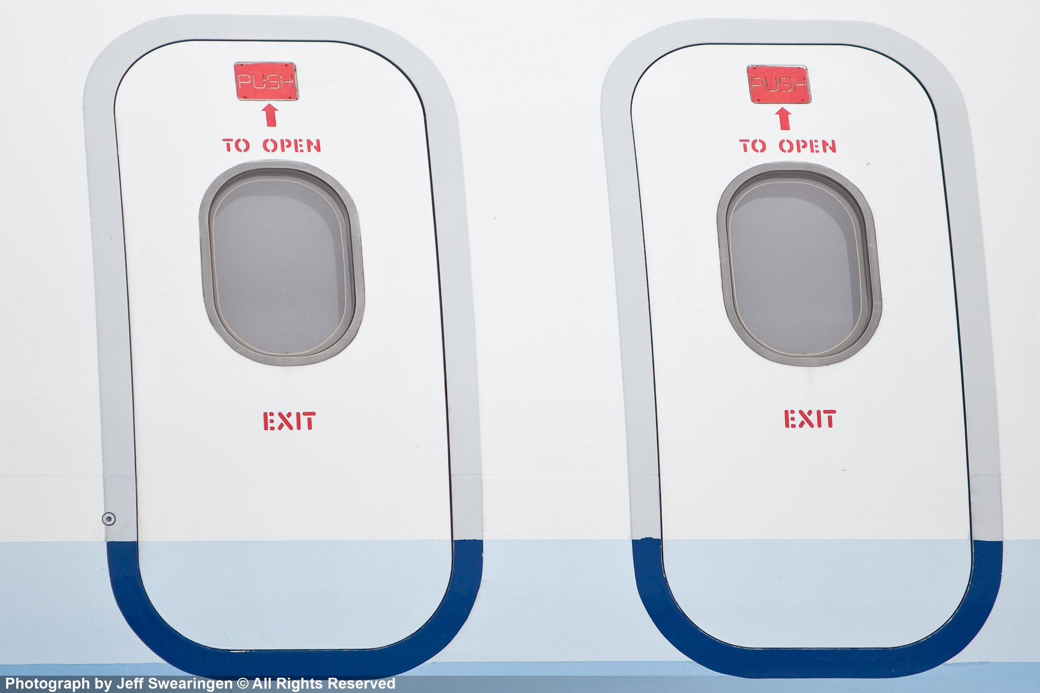 Overwing emergency exit doors on A320 N481UA by Jeff Swearingen / 500px