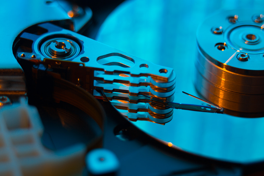 close up of hard disk by Ruslan Grigoriev / 500px