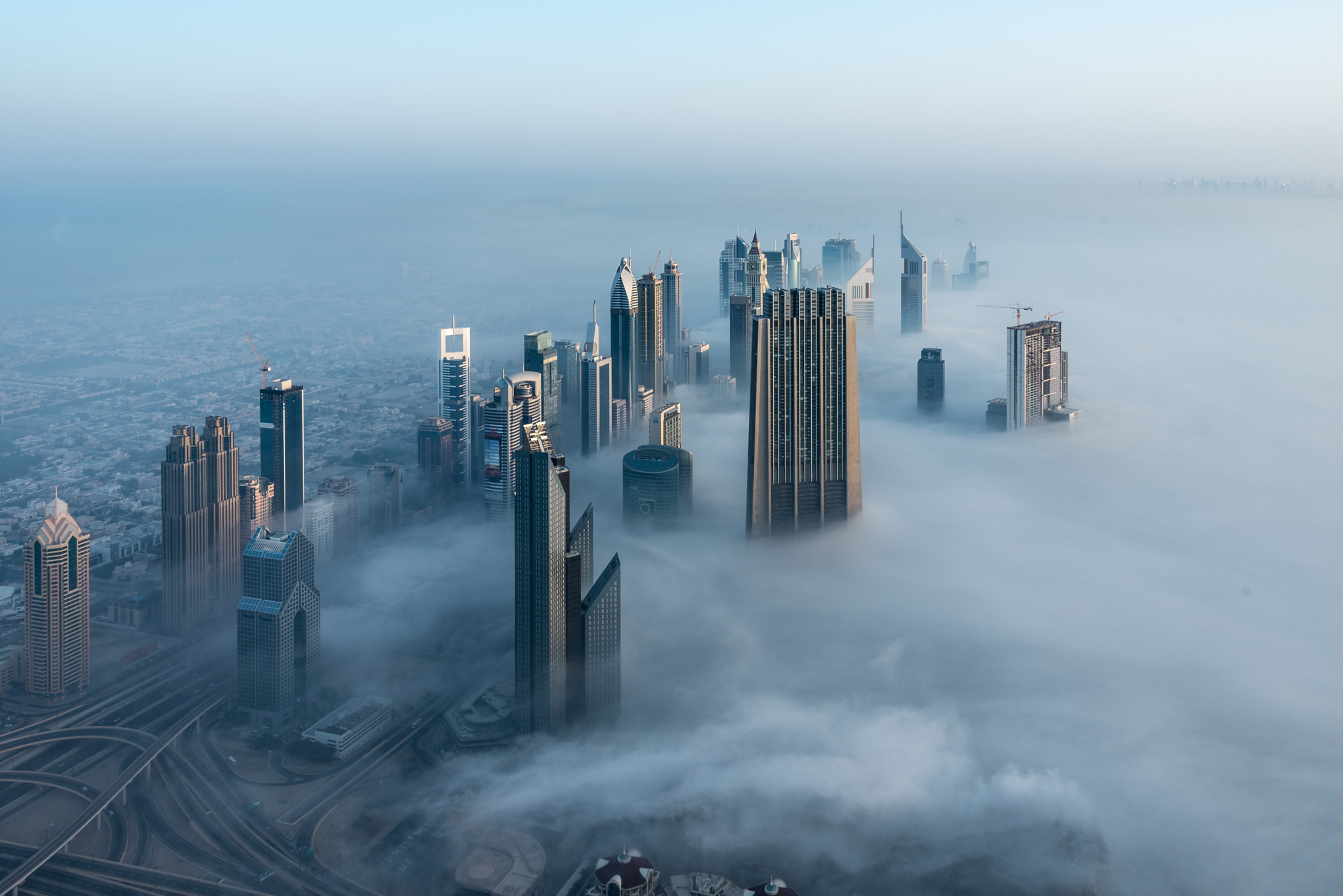 Dubai Downtown in Fog by Andreas Sigrist / 500px