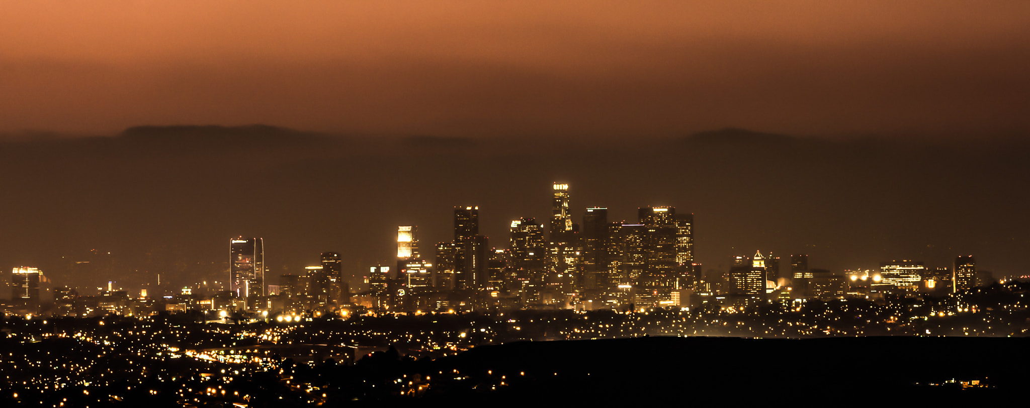 Hazy Los Angeles Skyline by Toby Dingle / 500px