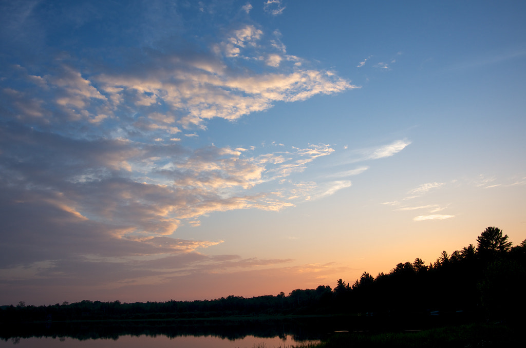 Sunset clouds by John Rivard / 500px
