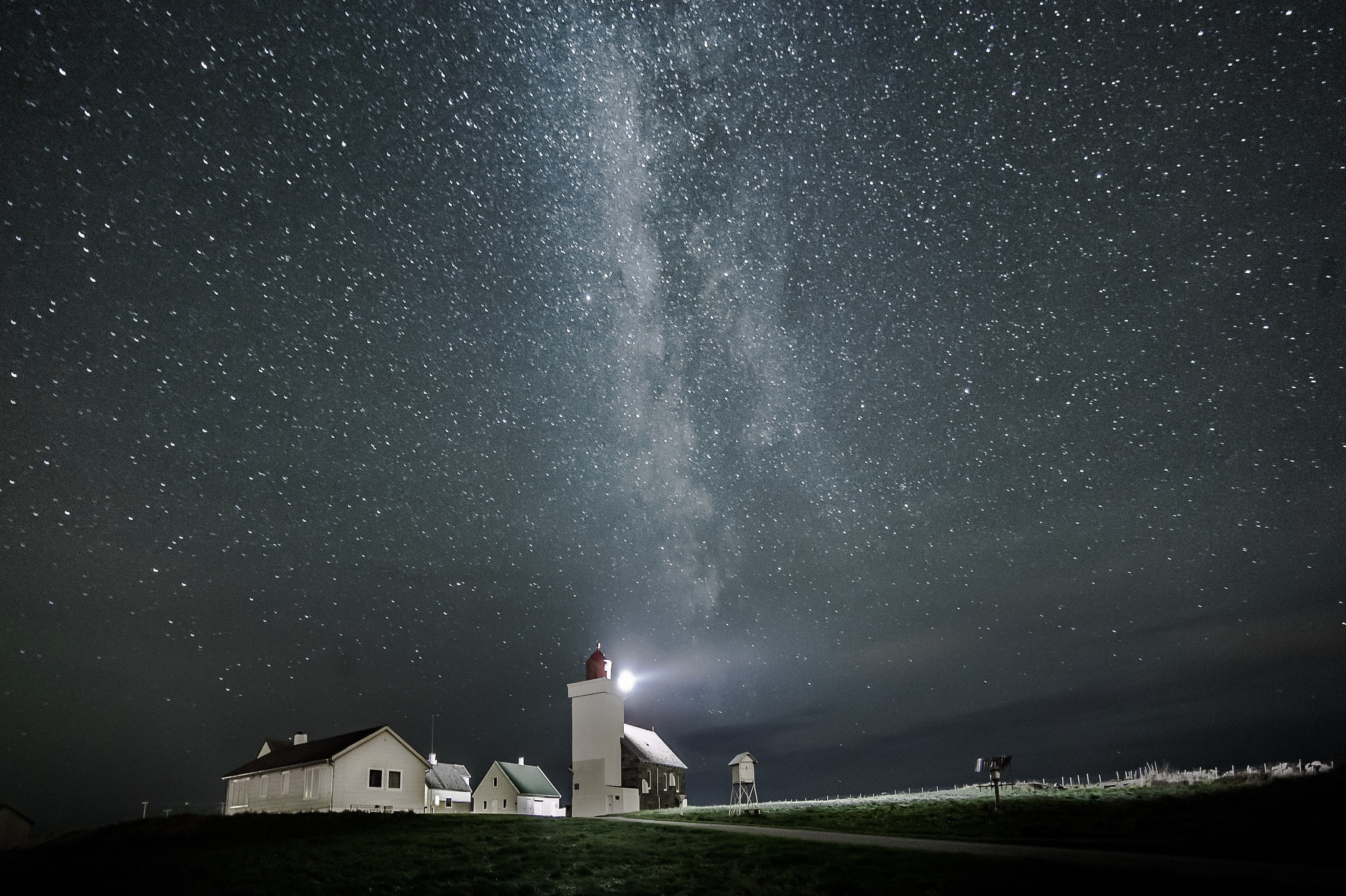 Obrestad lighthouse at night by Tore Heggelund / 500px