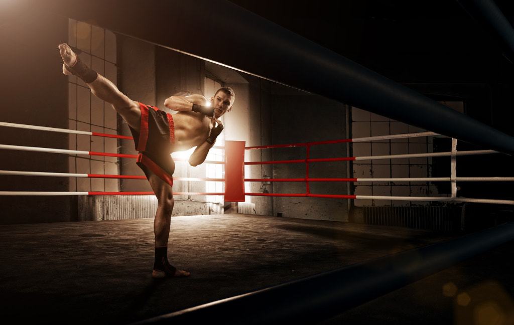 Young man kickboxing in the Arena by Gergely Zsolnai / 500px